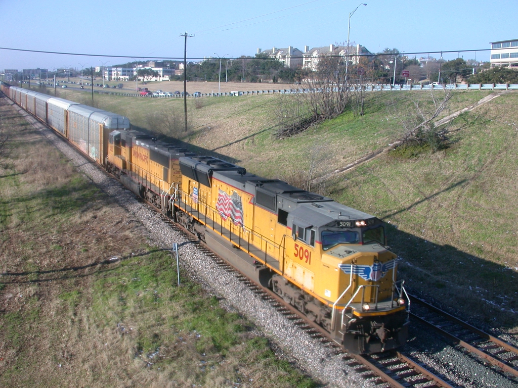 UP 5091 UP 4215 24Feb2010 NB through SNEED at Far West Blvd